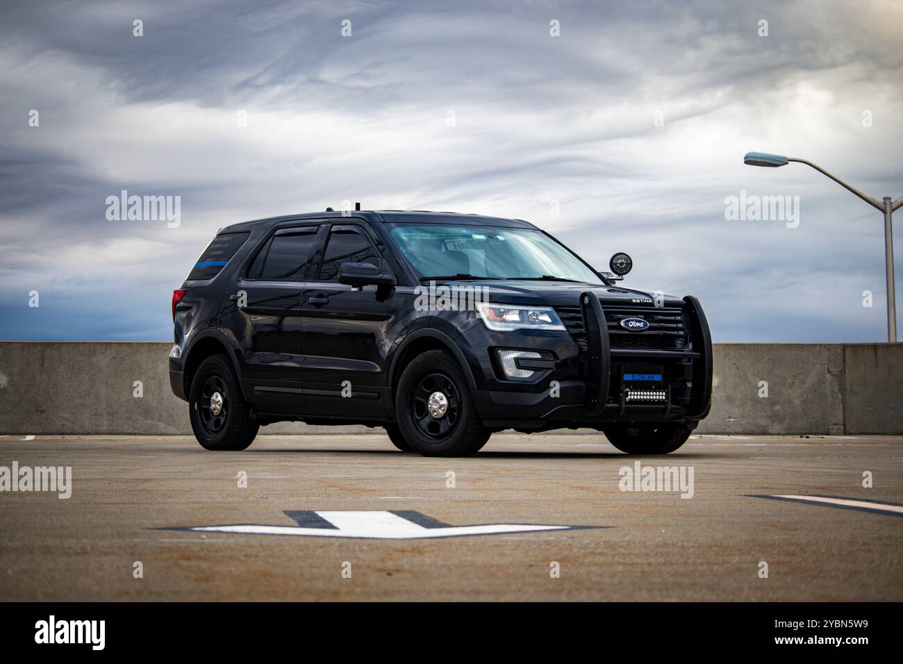 American cop car, Ford Police Interceptor Utility, on parking garage ...