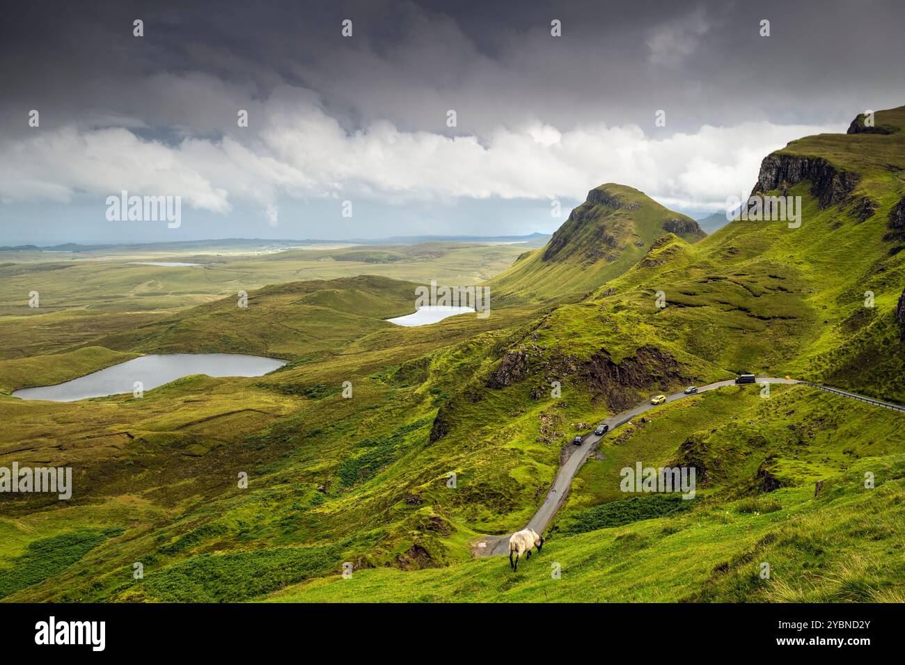 Cars driving on the road through the Quiraing on the Isle of Skye ...