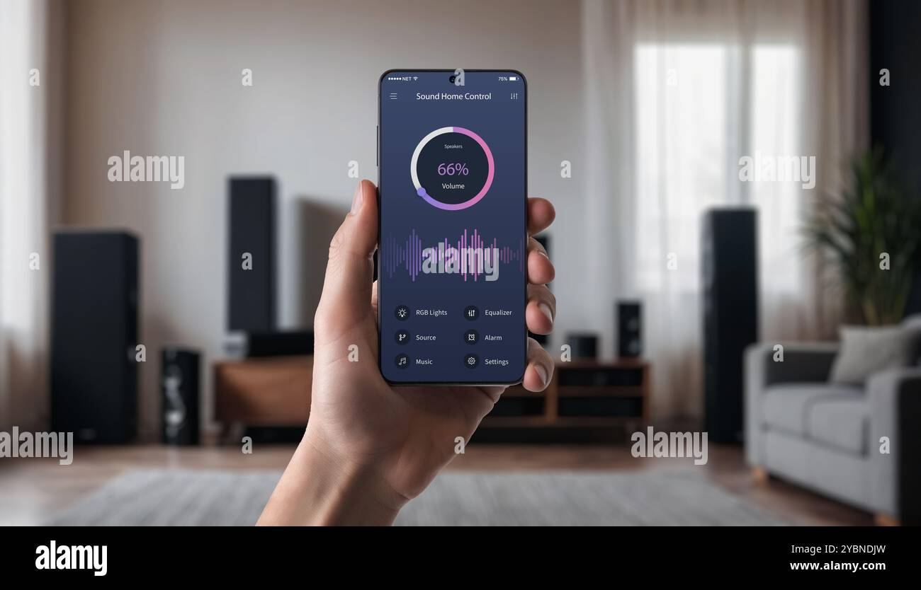 Controlling home sound system with a mobile app. Hand holding ...
