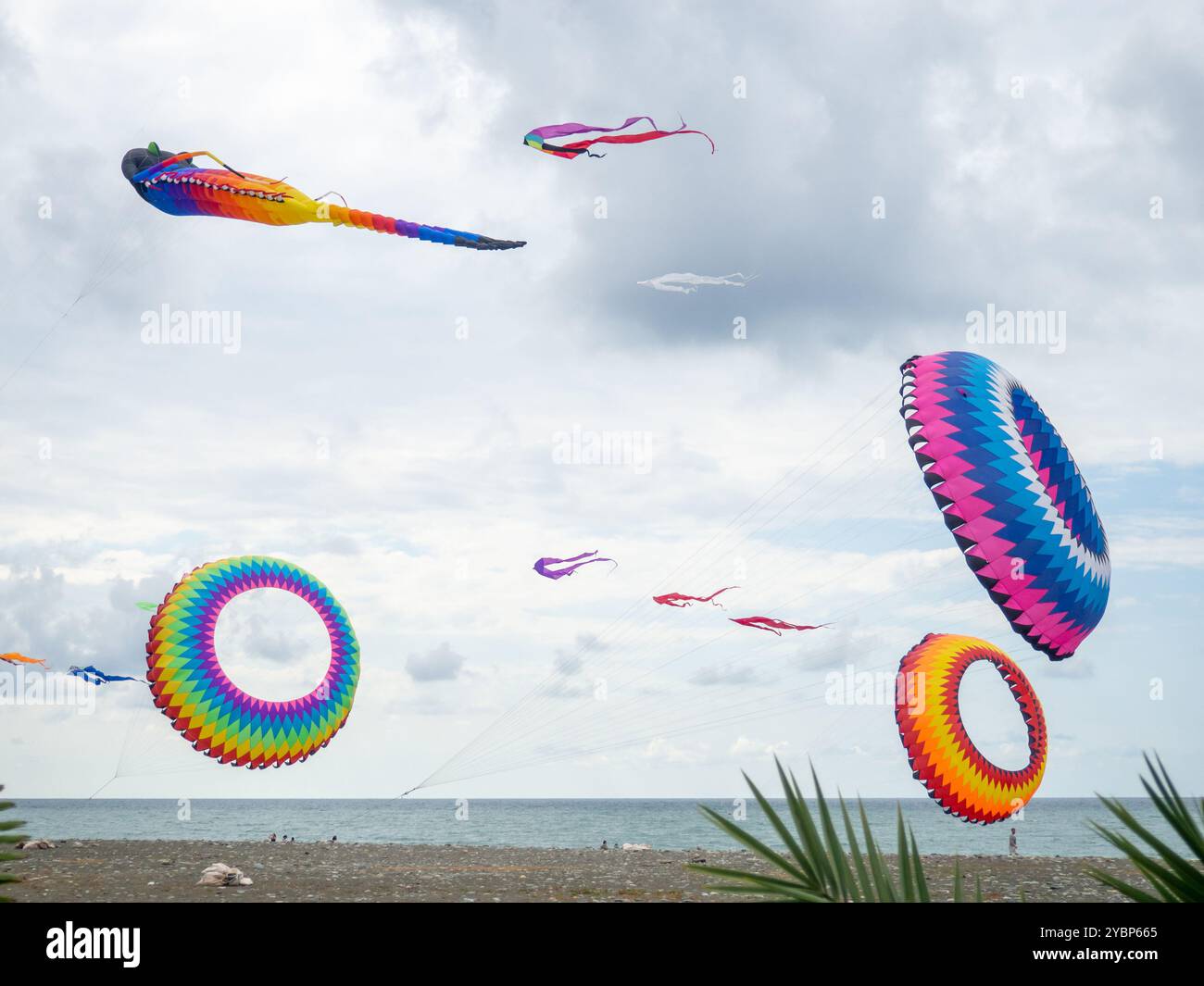 Kite Festival. Bright animal-shaped kites. Weekend at sea. Holiday and ...