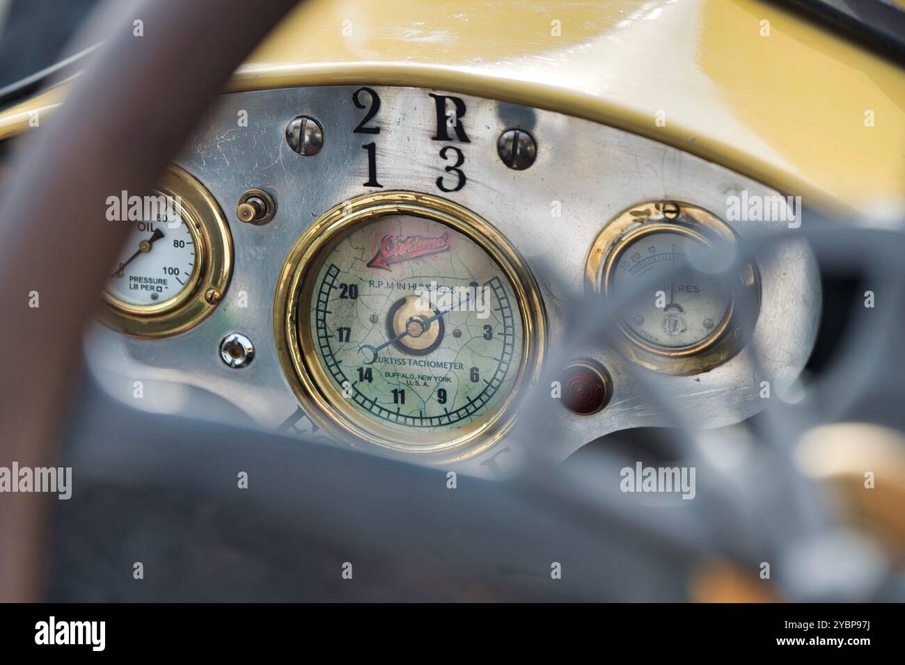 Vintage classic car tachometer (rev counter) on aluminium dashboard ...