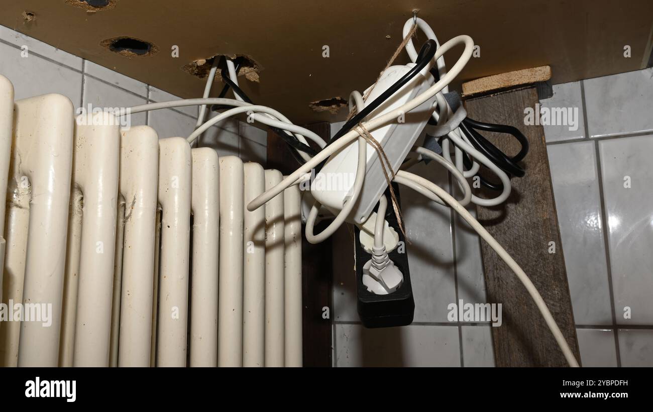 Cable clutter with power strips in the kitchen to supply power to ...
