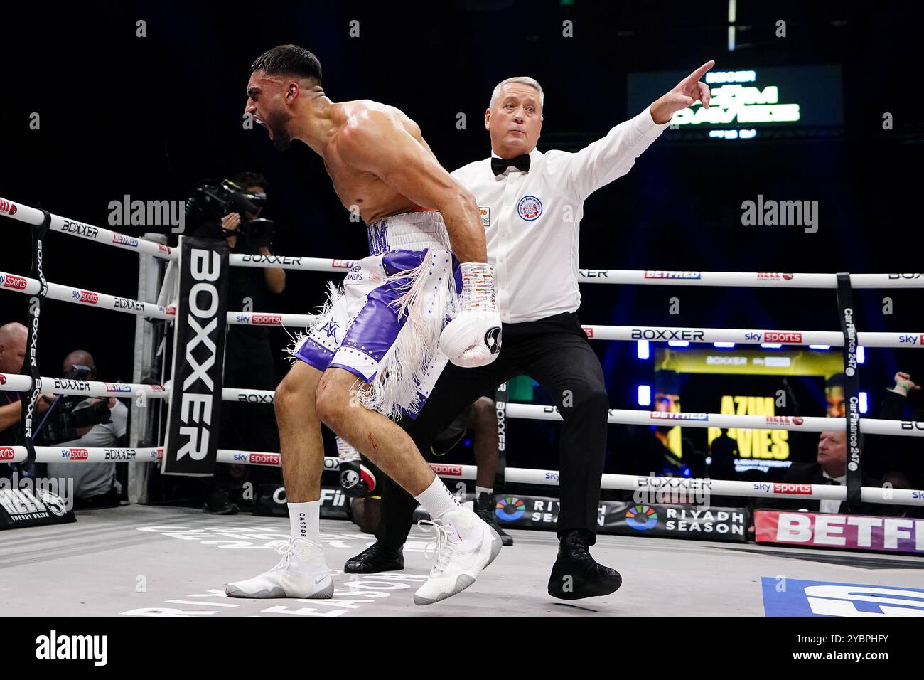Adam Azim celebrates during the Super-Lightweight bout against Ohara ...