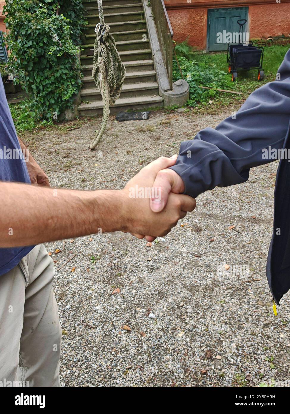 handshake as sign of trust, organization and leading of coworkers ...