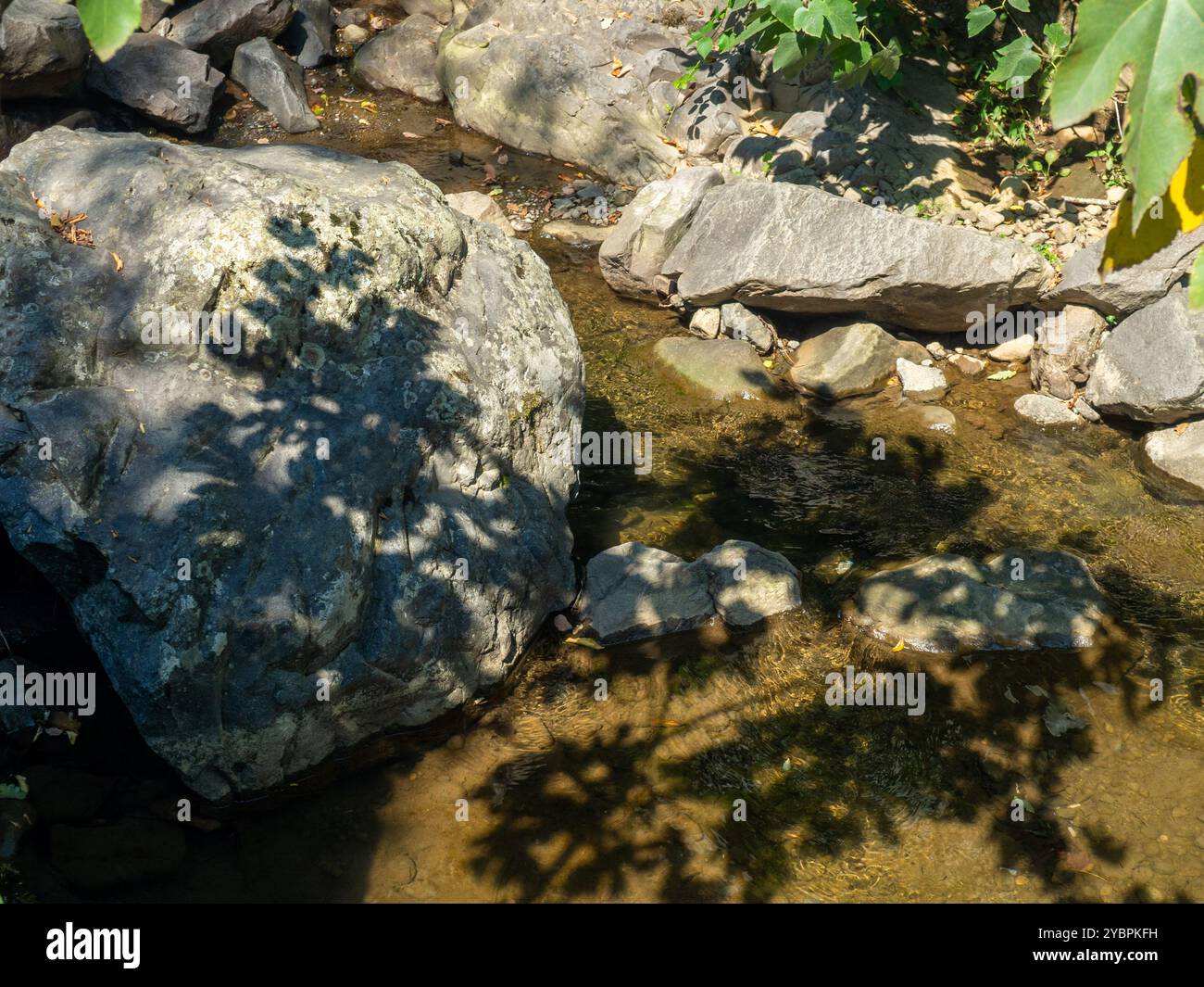 Large boulders in a stream. Mountain river. Nature. Water flow Stock ...