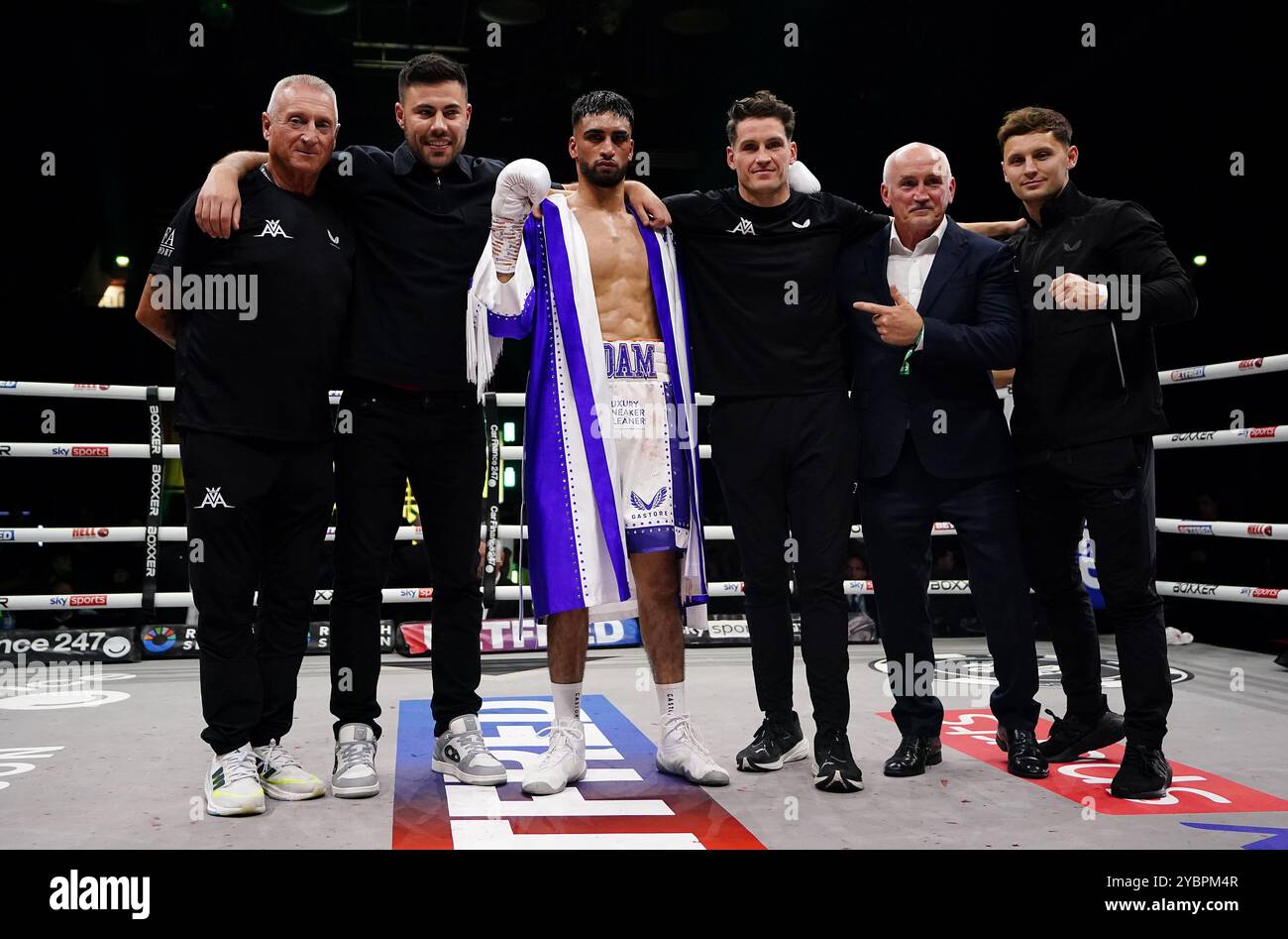 Adam Azim (third left) celebrates with his team after winning the Super ...