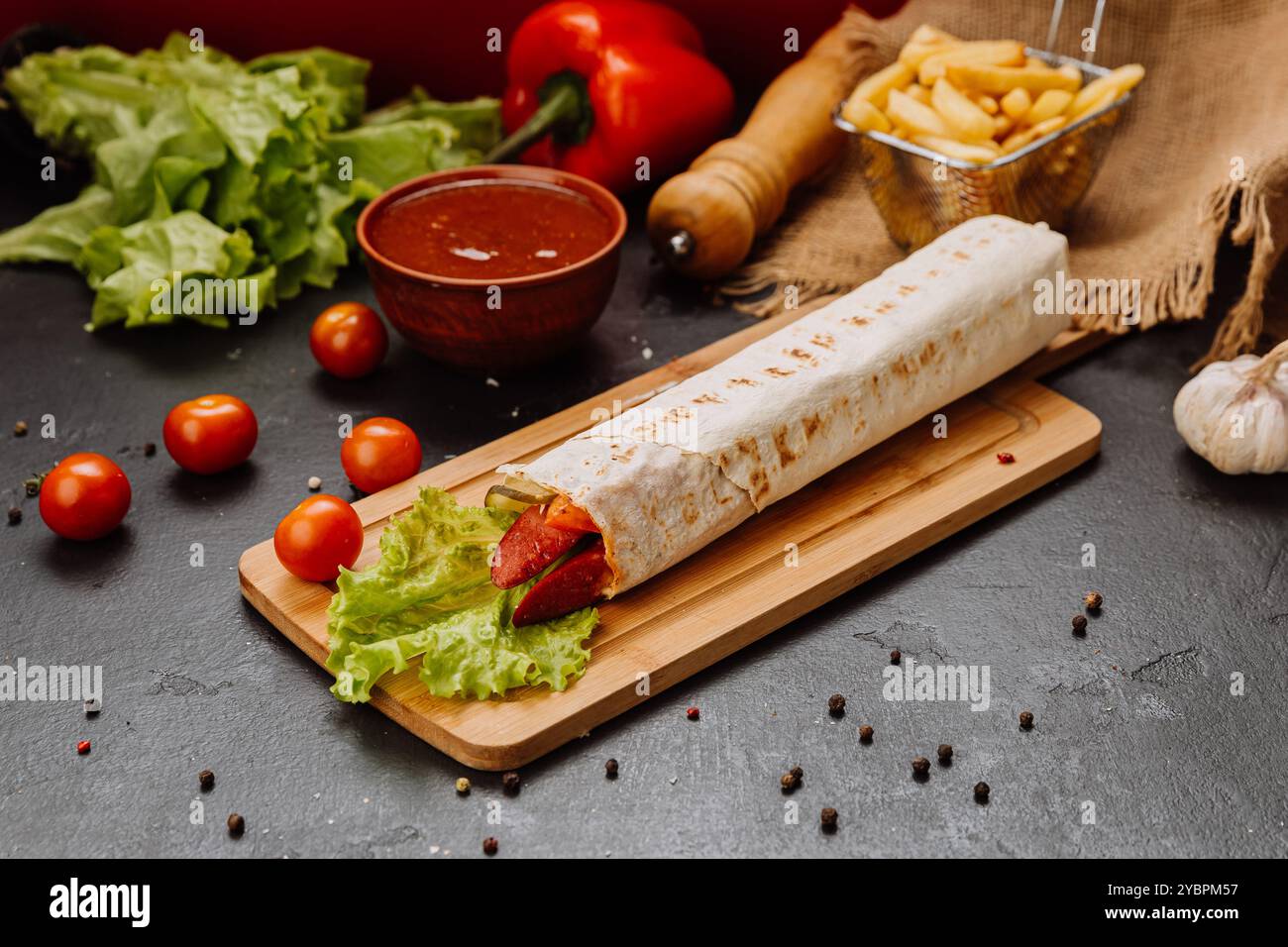 Grilled sausage wrap with fresh lettuce, a perfect quick snack or meal ...