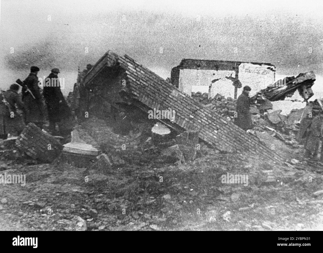 Soviet soldiers explore the remains of one of the four crematoria ...
