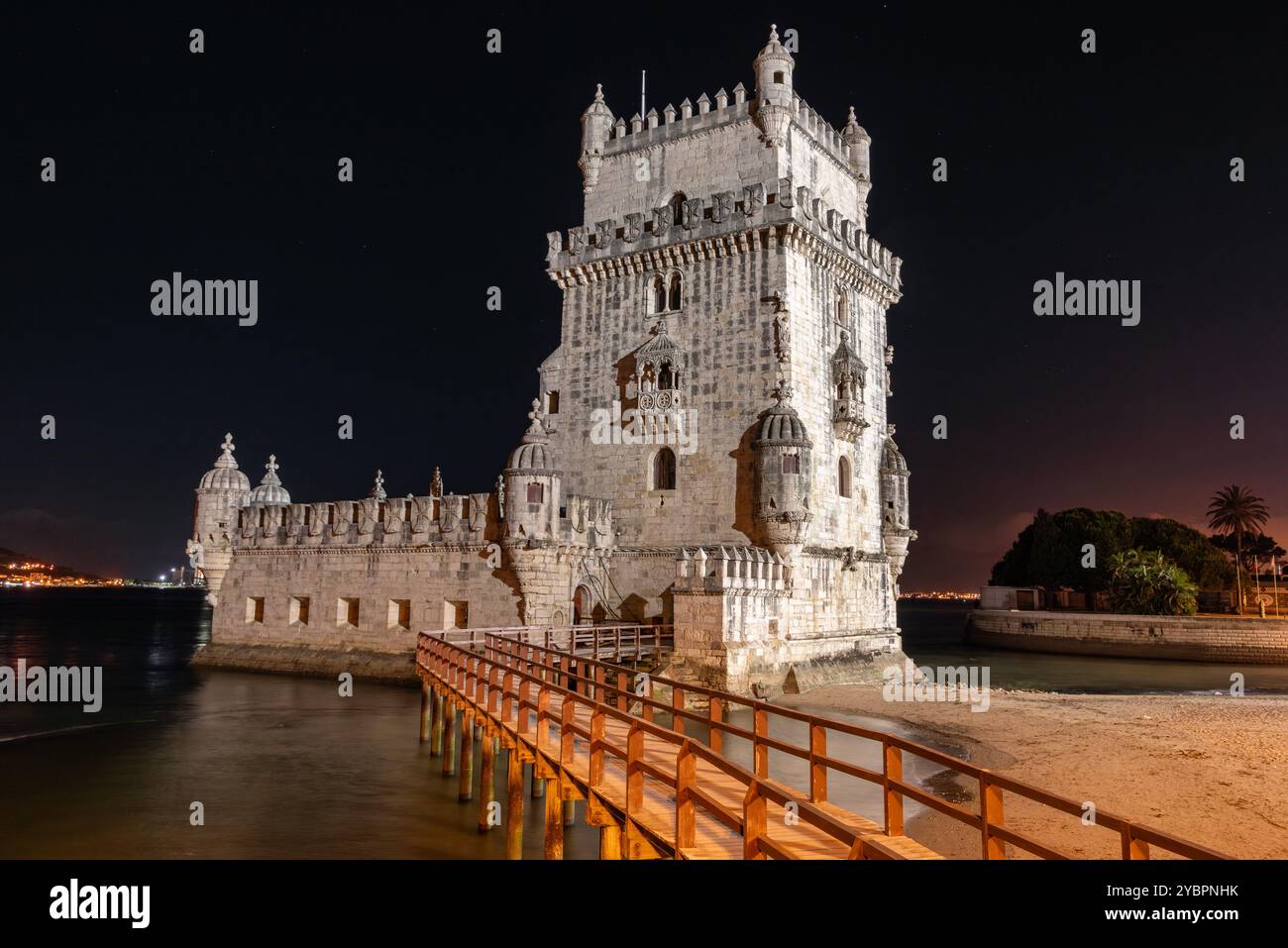 Iconic manueline gothic belem tower in lisbon at night hi-res stock ...