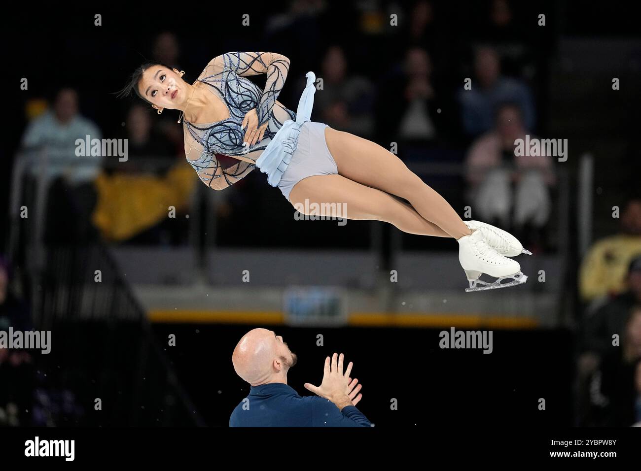 Ellie Kam and Danny O'Shea of the United States compete during the ...