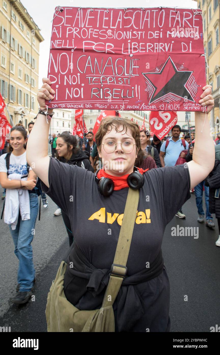 Rome, Italy. 19th Oct, 2024. A protester holds up a sign with a verse ...