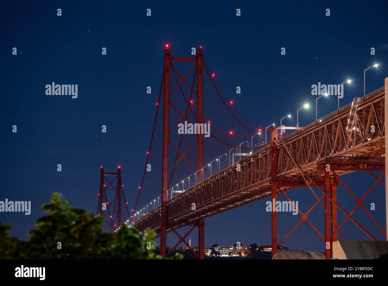Iconic red bridge of the 25 April in Lisboa at night, Portugal Stock ...