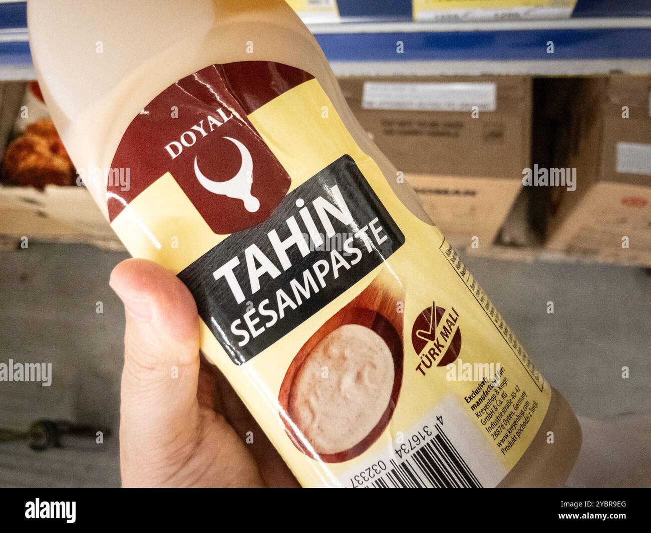BELGRADE, SERBIA - AUGUST 21, 2024: Doyal Tahini jars displayed on a supermarket shelf. Tahini ...
