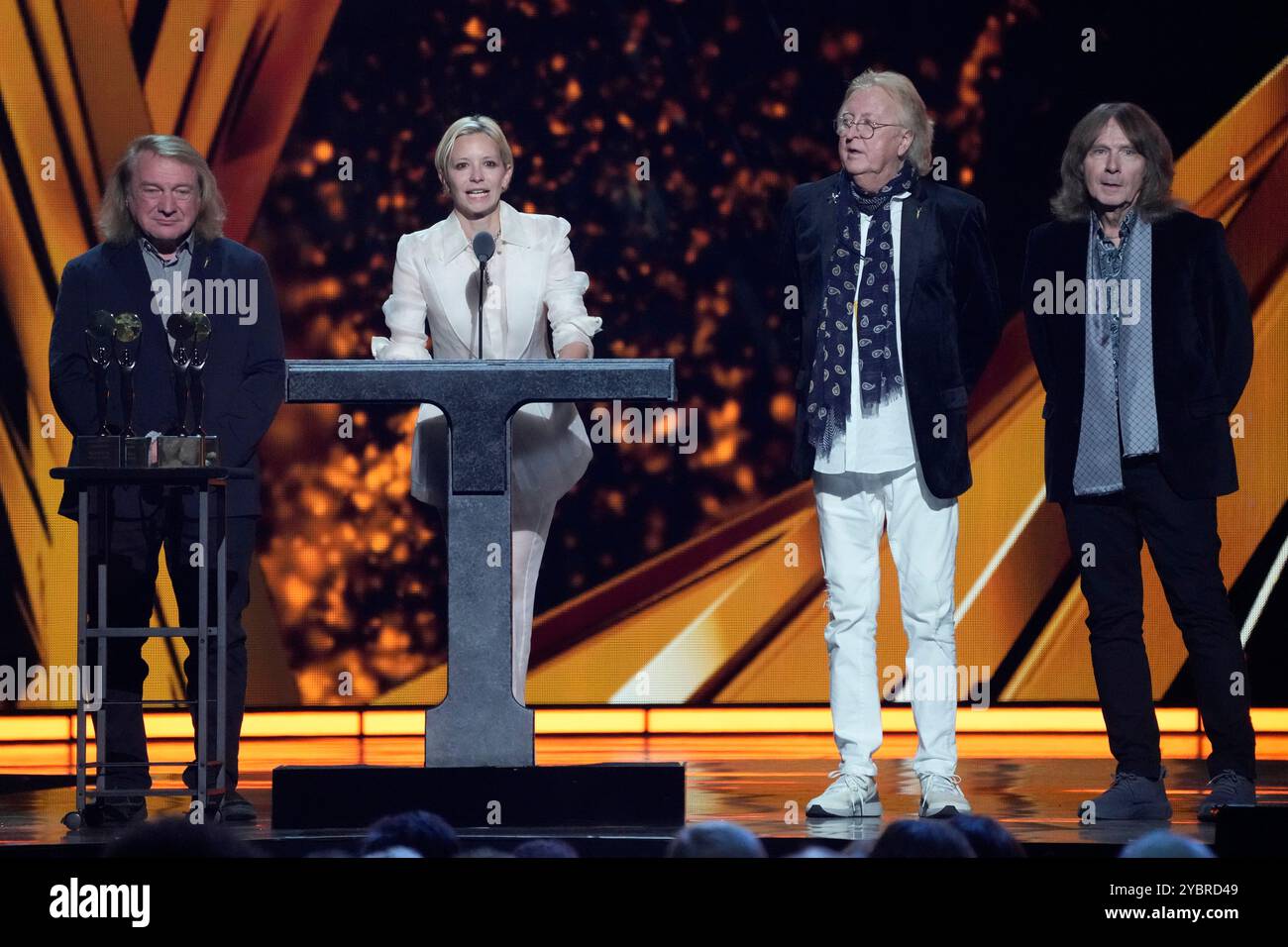 Lou Gramm, from left, Annabelle Dexter-Jones, daughter of Mick Jones ...