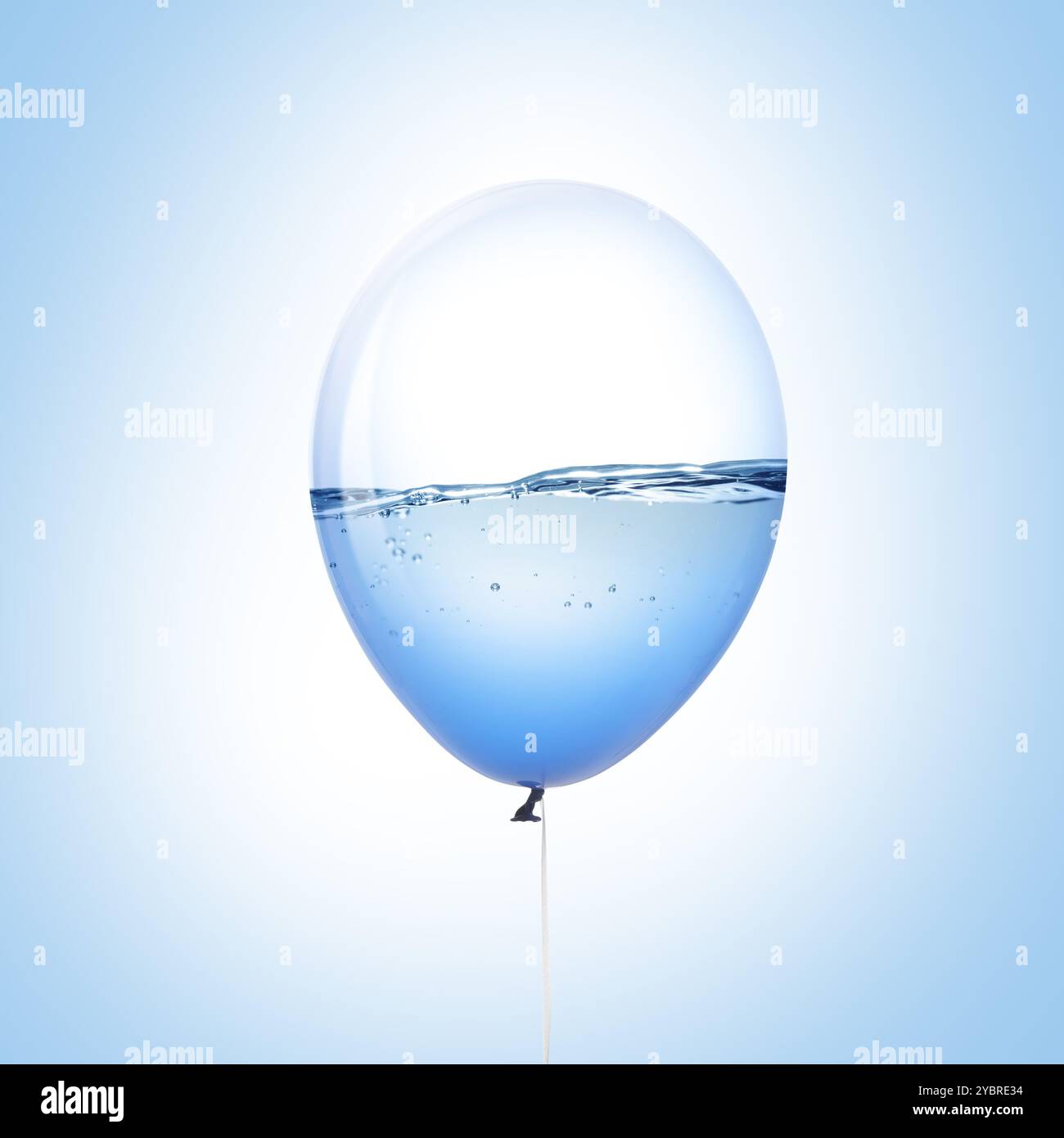 Balloon with water inside on light blue background Stock Photo - Alamy
