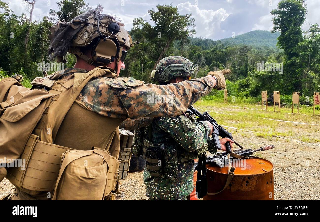 U.S. Marine Corps Cpl. Caden Young, left, a grenadier assigned to Bravo ...