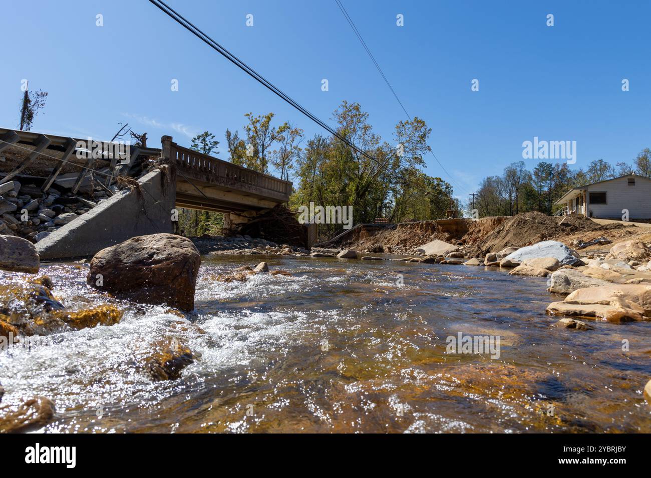 A severely damaged bridge over the North Fork of the Catawba River in ...