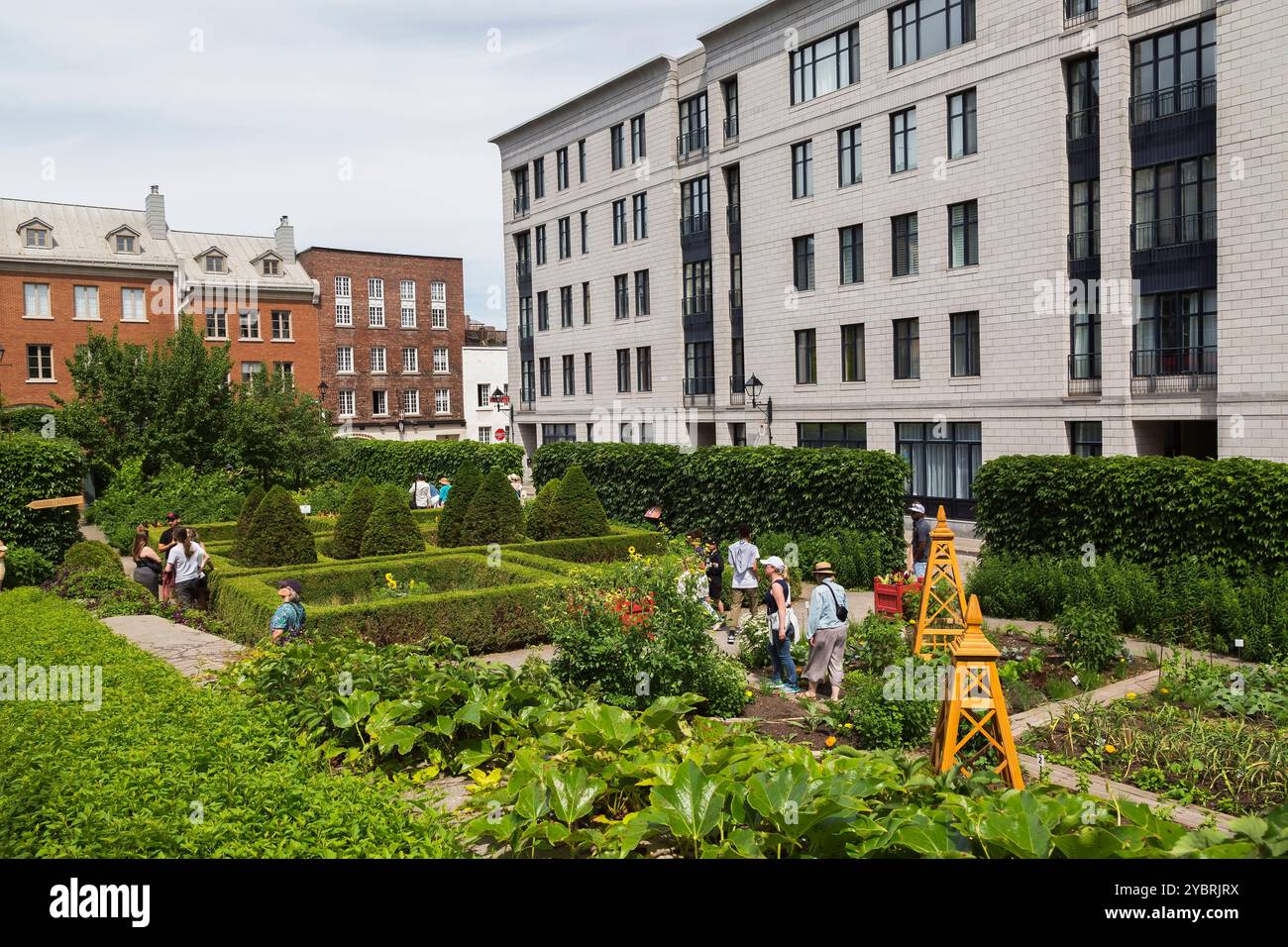 Tourists and visitors walking about the Governor's divided plants and ...