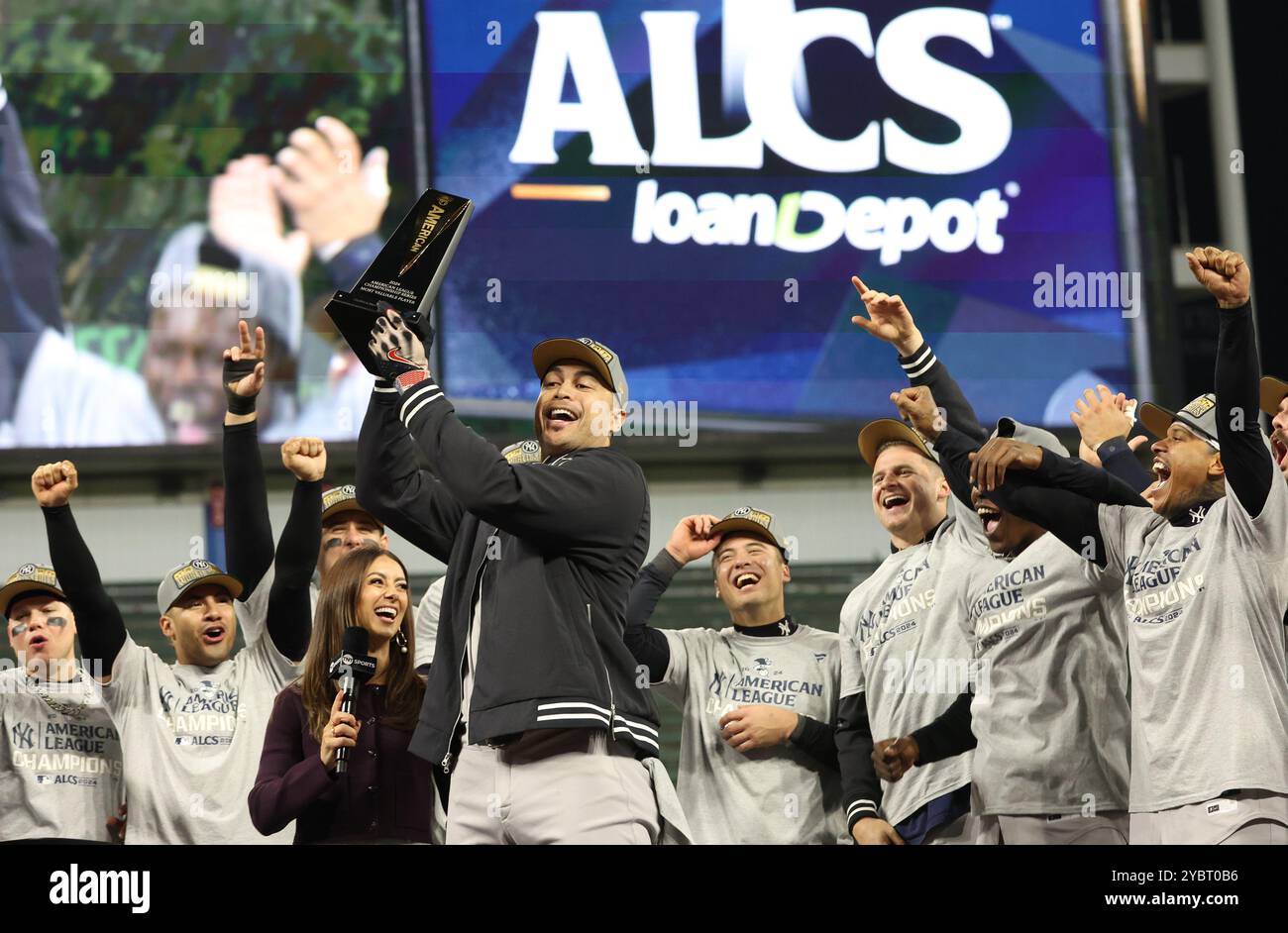 New York Yankees Giancarlo Stanton holds the ALCS MVP award after the Yankees beat the Cleveland ...