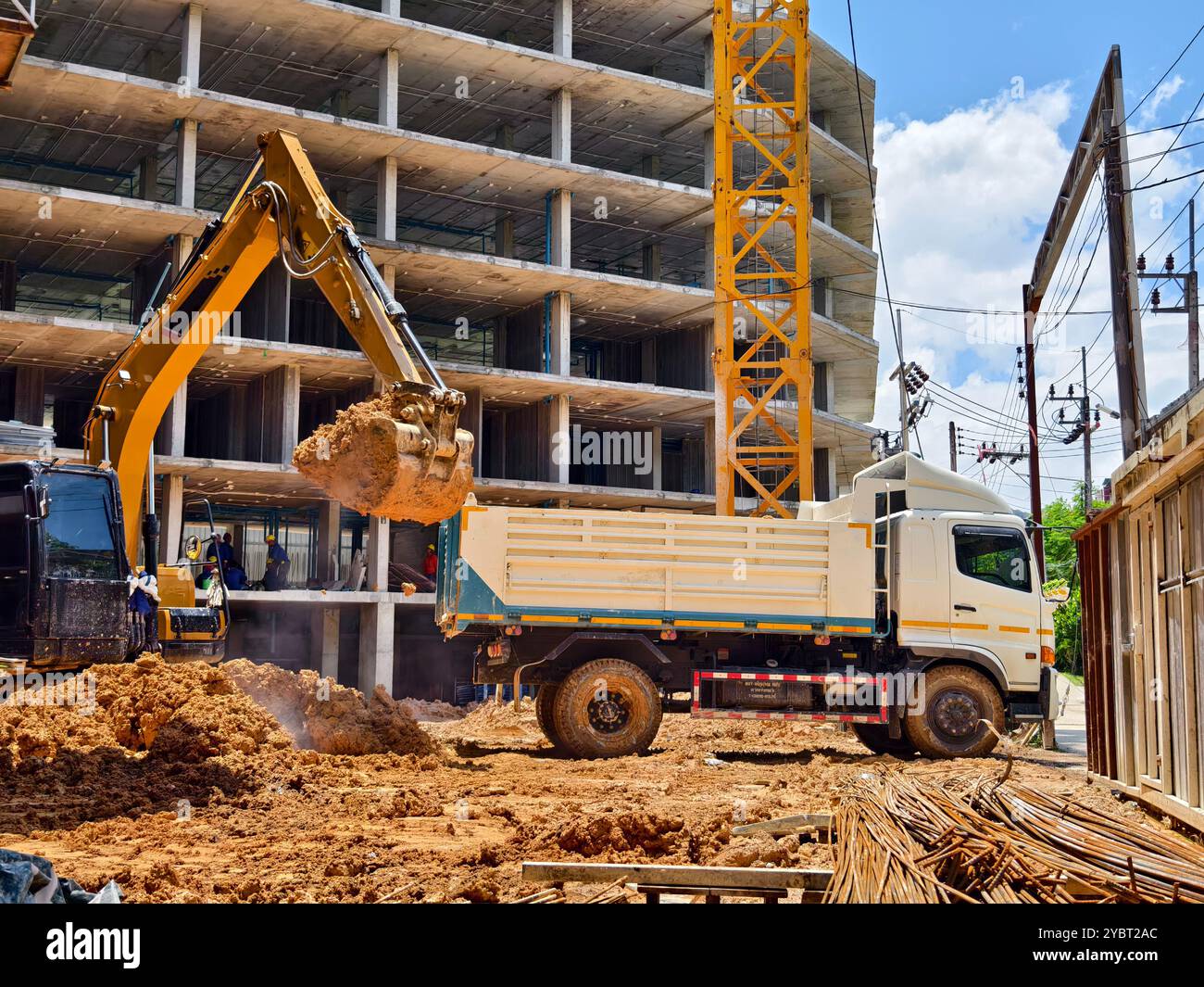 Construction excavator loads concrete hi-res stock photography and ...