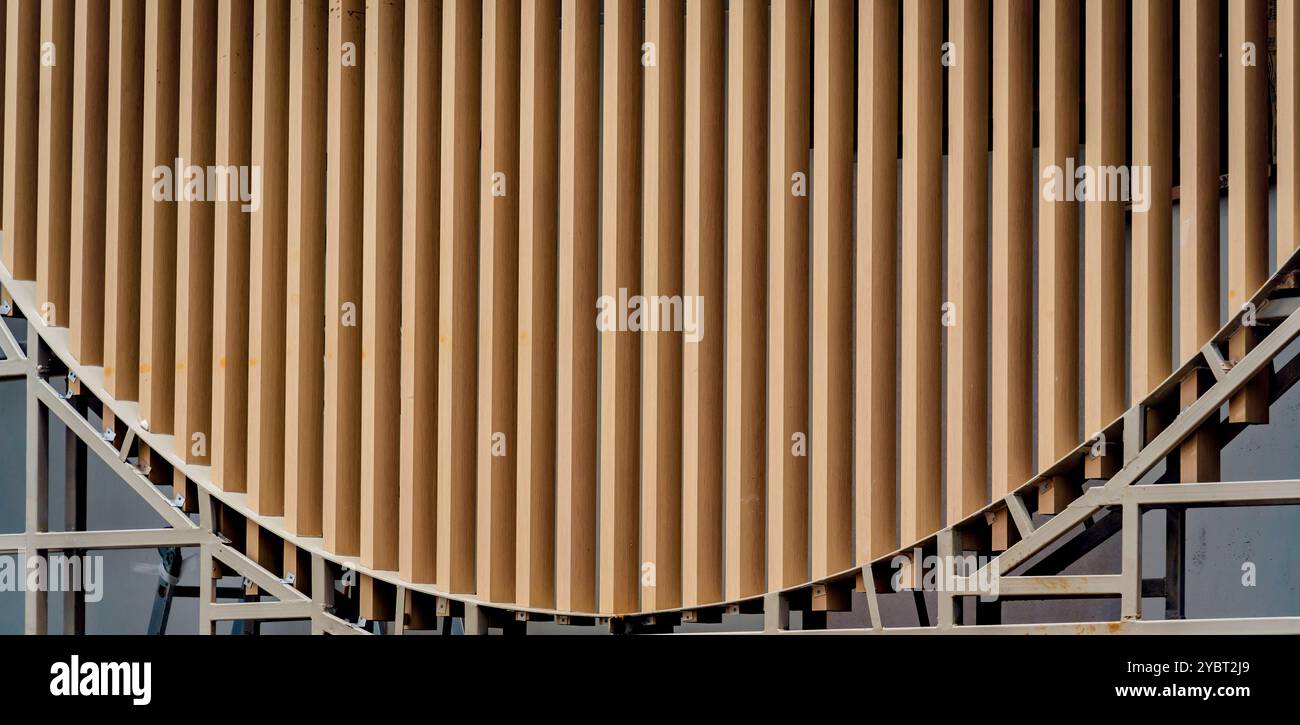 A structure featuring wooden slats on construction site contributing to ...