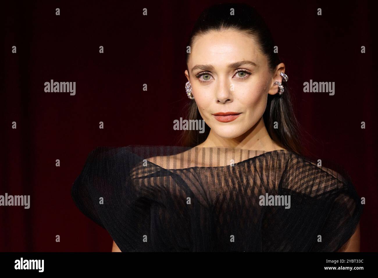 Elizabeth Olsen arrives at the fourth annual Academy Museum Gala on ...