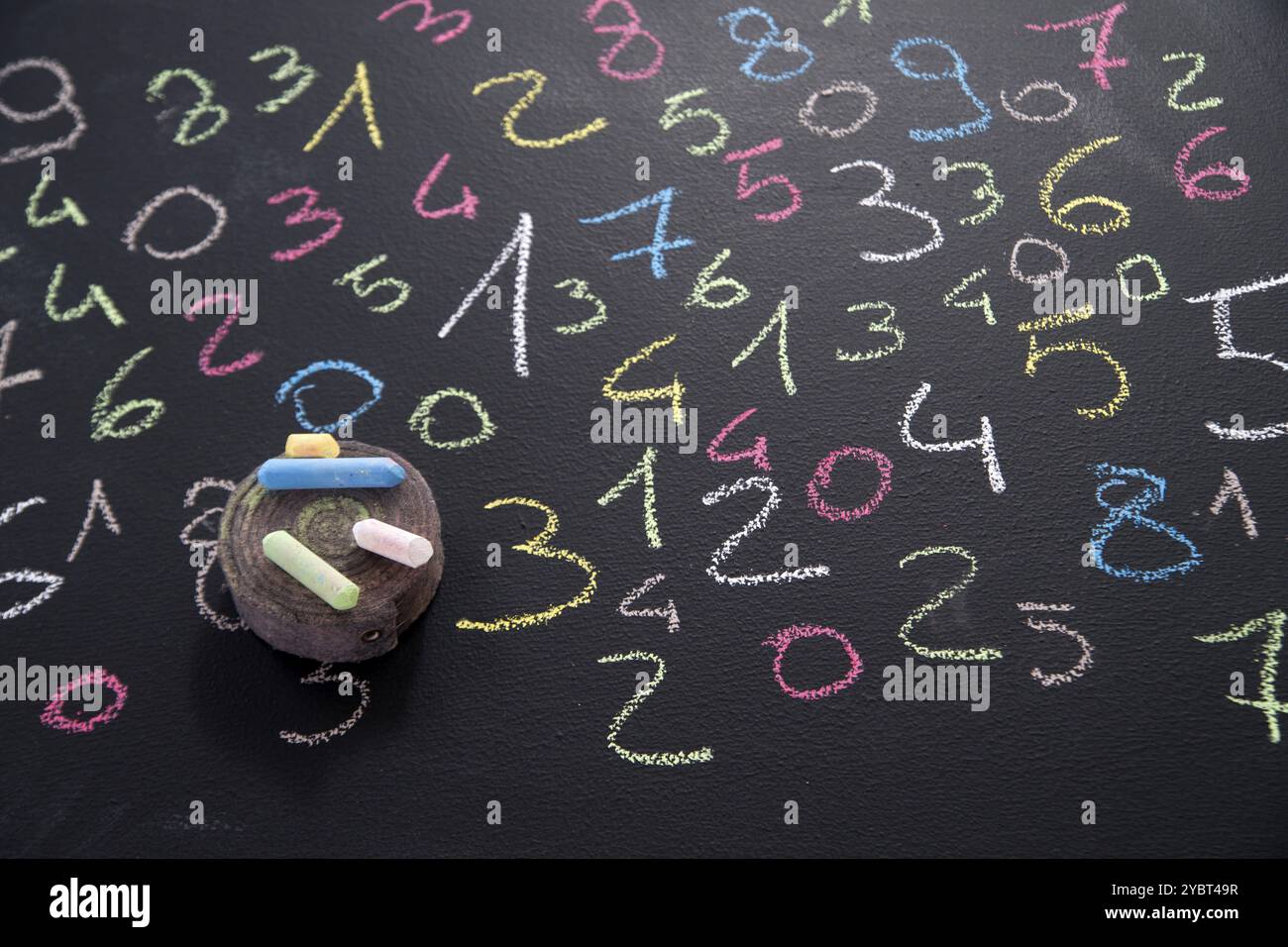 Graphic representation with chalk on blackboard with colorful numbers ...