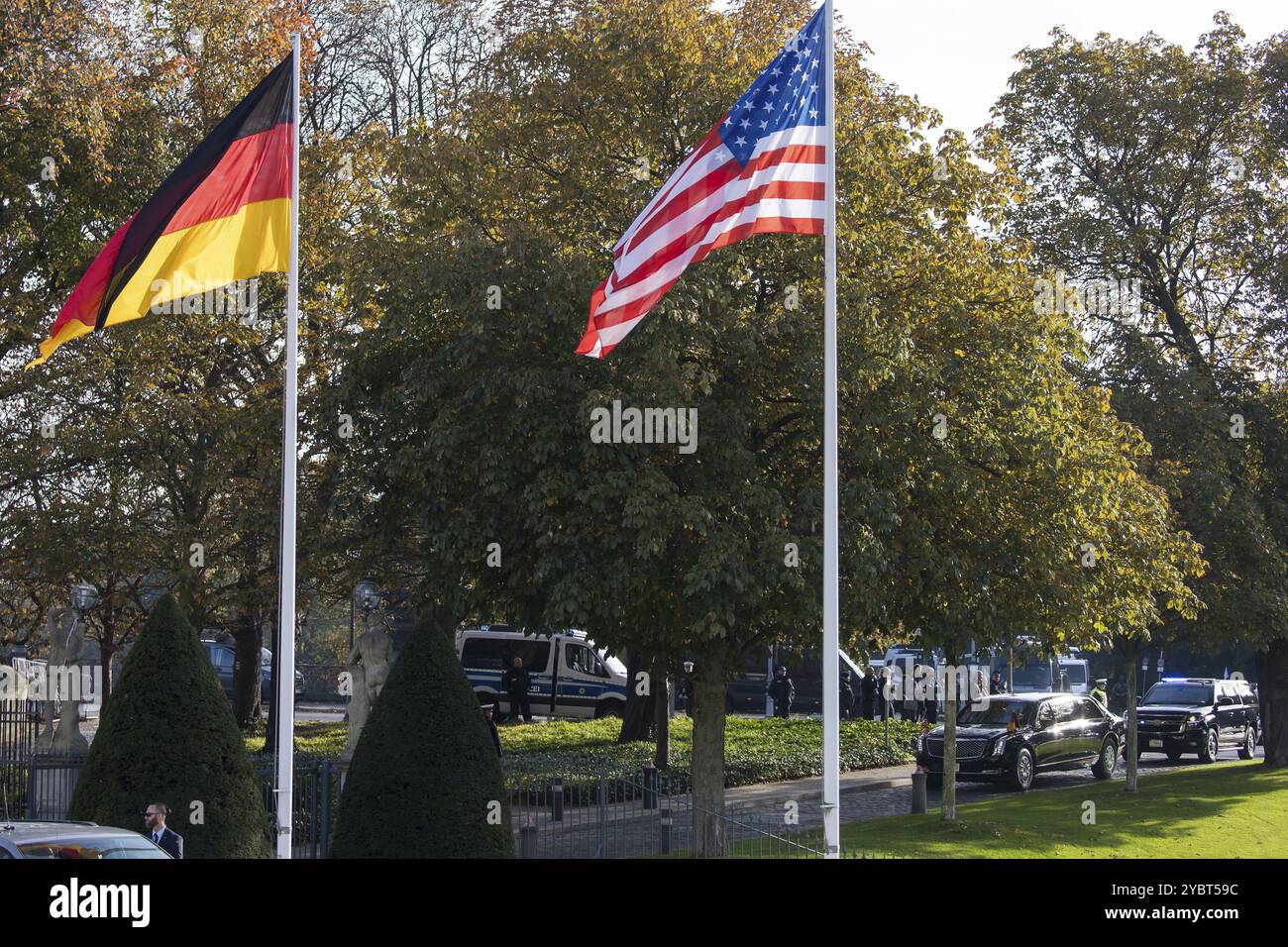 Joe Biden (46th President of the United States) drives past the flags ...