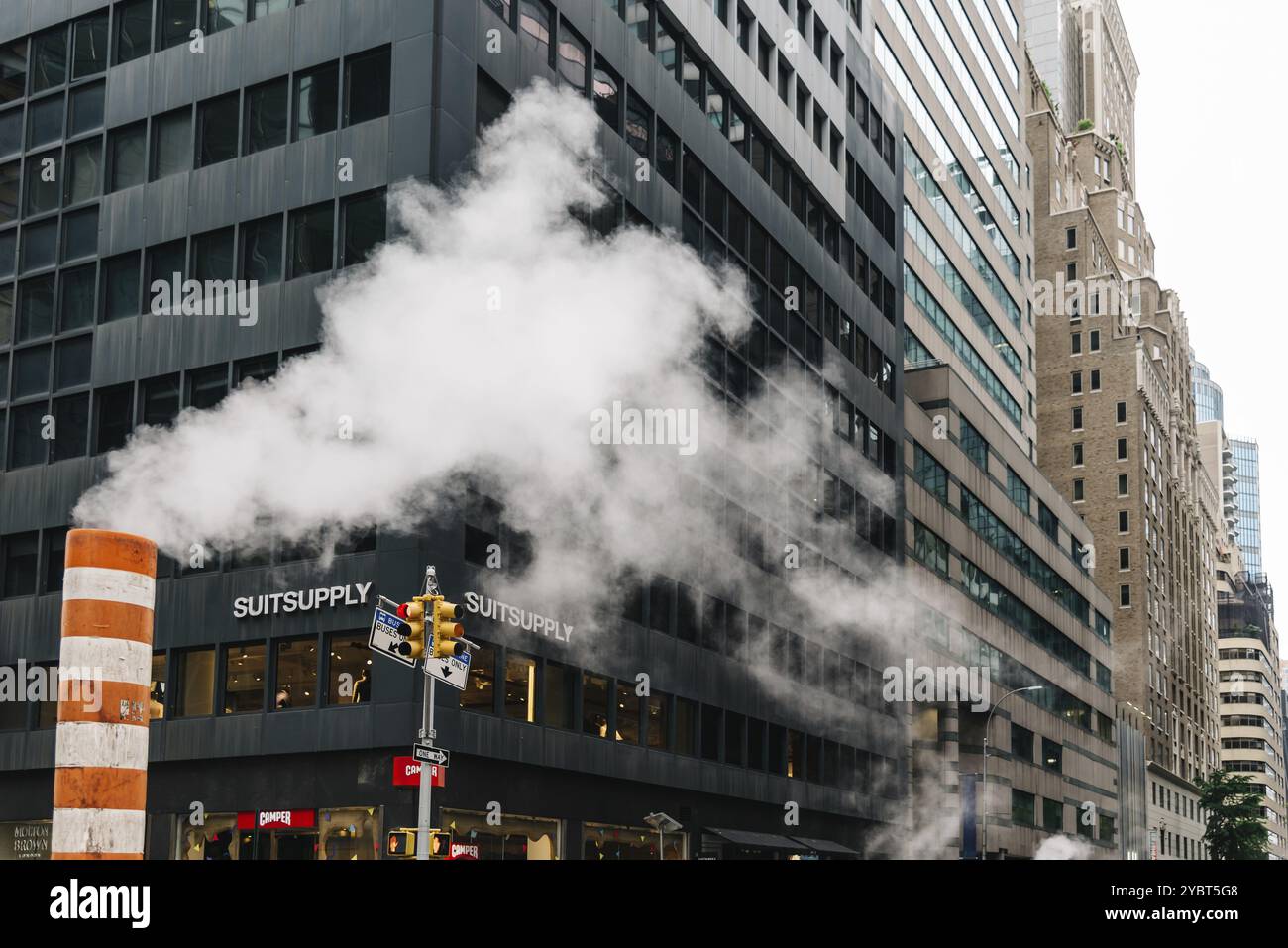New York City, USA, June 24, 2018: Steam coming out stack for venting ...