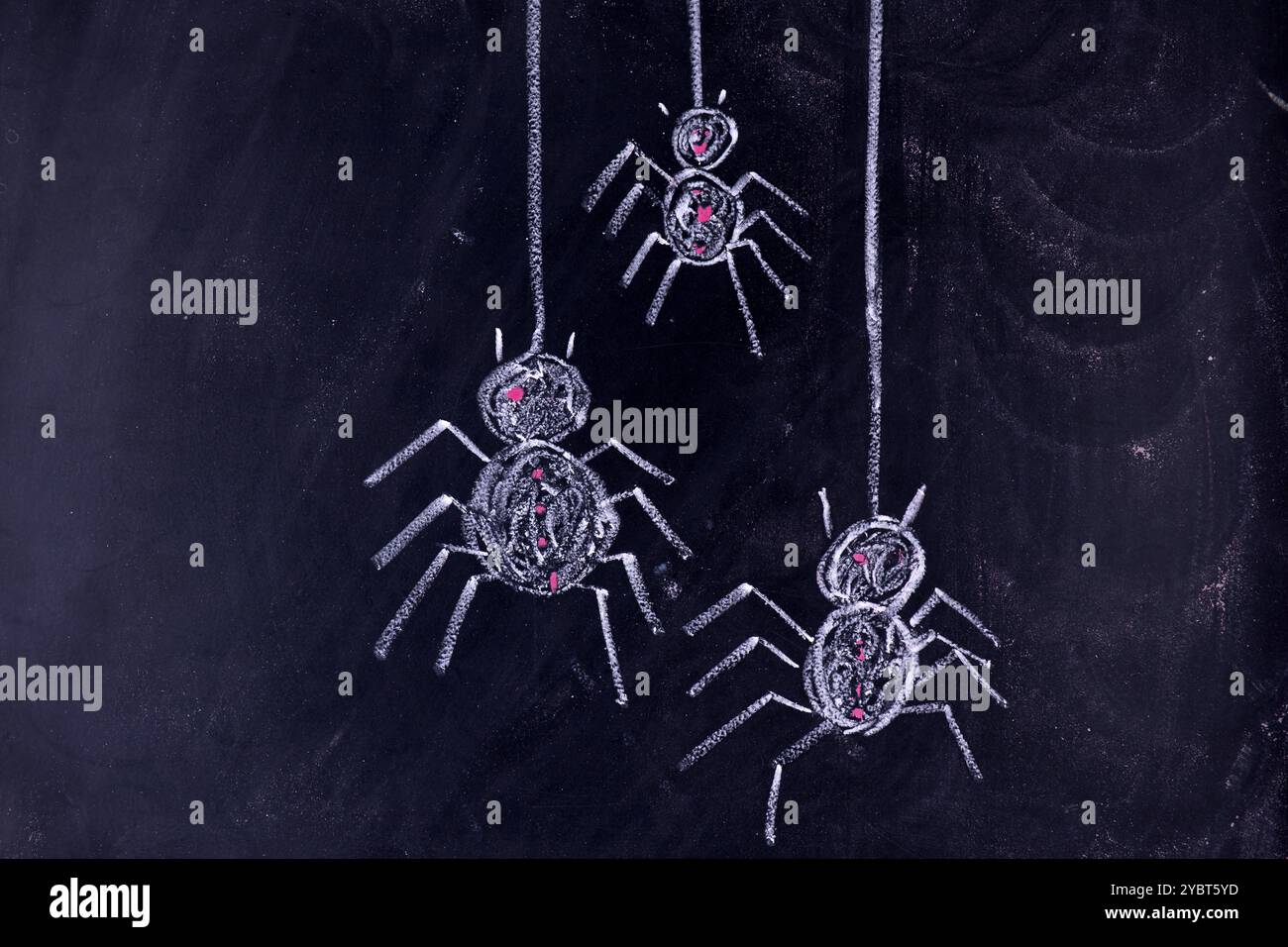 Graphic representation with chalk on the blackboard of arachnophobia ...