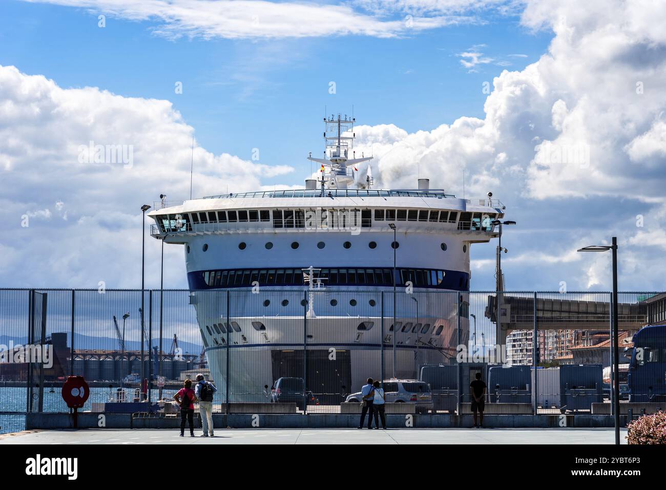 Ferry ship loading cars in the terminal of a city port Stock Photo - Alamy