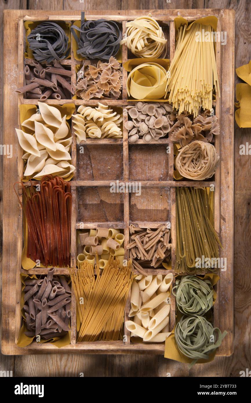 Presentation in wooden varieties of pasta made in Italy Stock Photo - Alamy