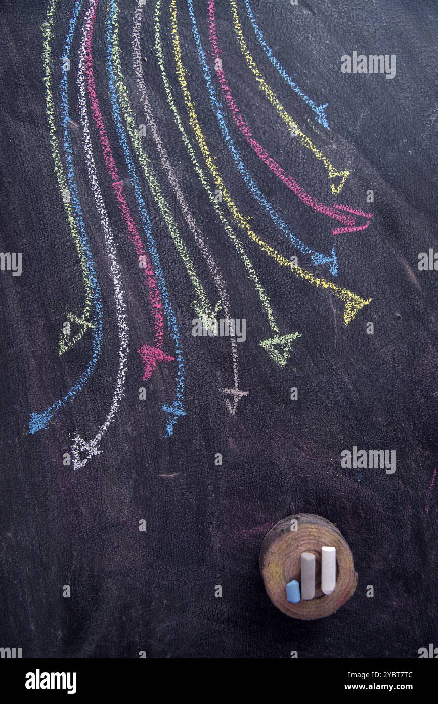 Curved colored arrows drawn with chalk on blackboard Stock Photo - Alamy