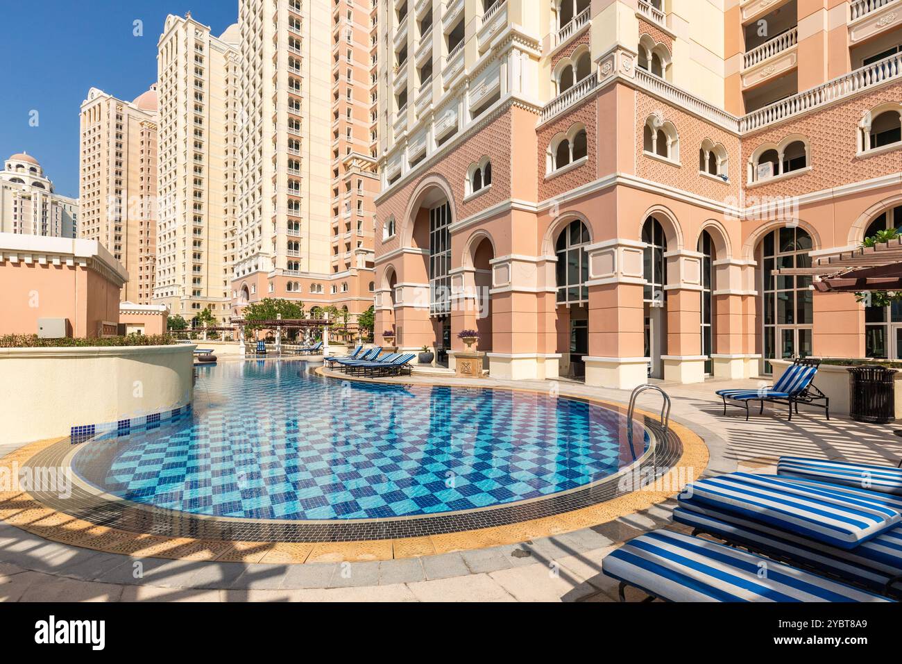 Swimming Pool area of The Pearl Island Apartments in Doha, Qatar Stock ...