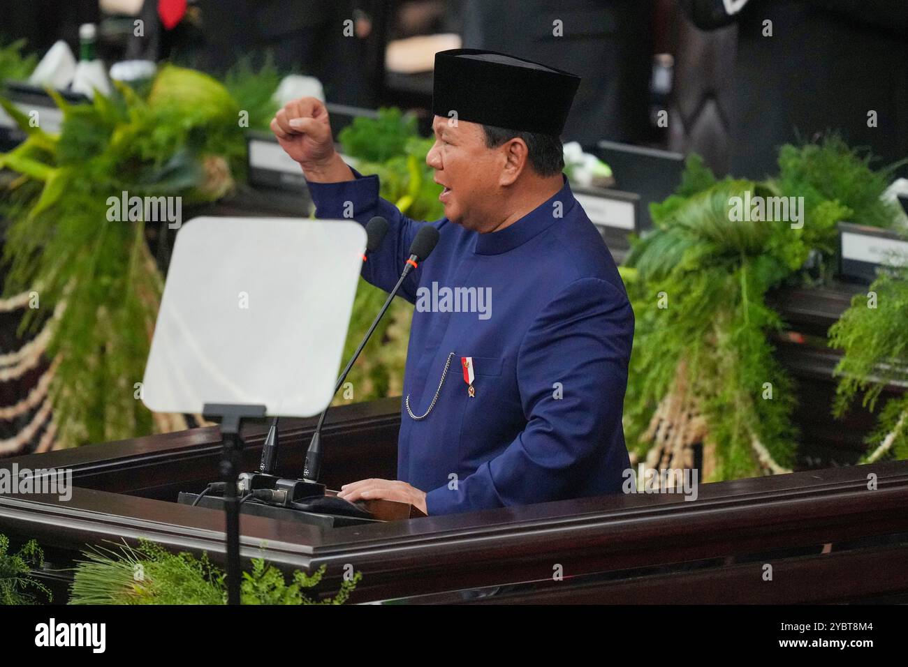 Indonesia's newly-inaugurated President Prabowo Subianto delivers a speech during the ...