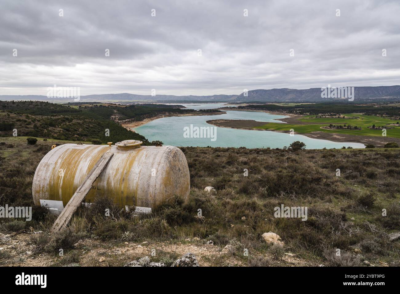 Fiberglass water tank and reservoir with turquoise waters in spring on ...