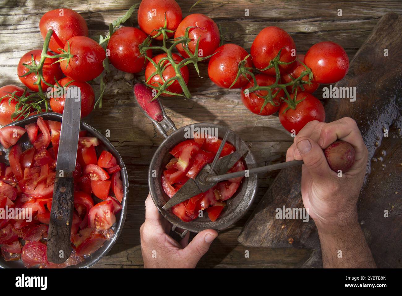 Preparation with strainer preserve fresh smooth round tomato Stock ...