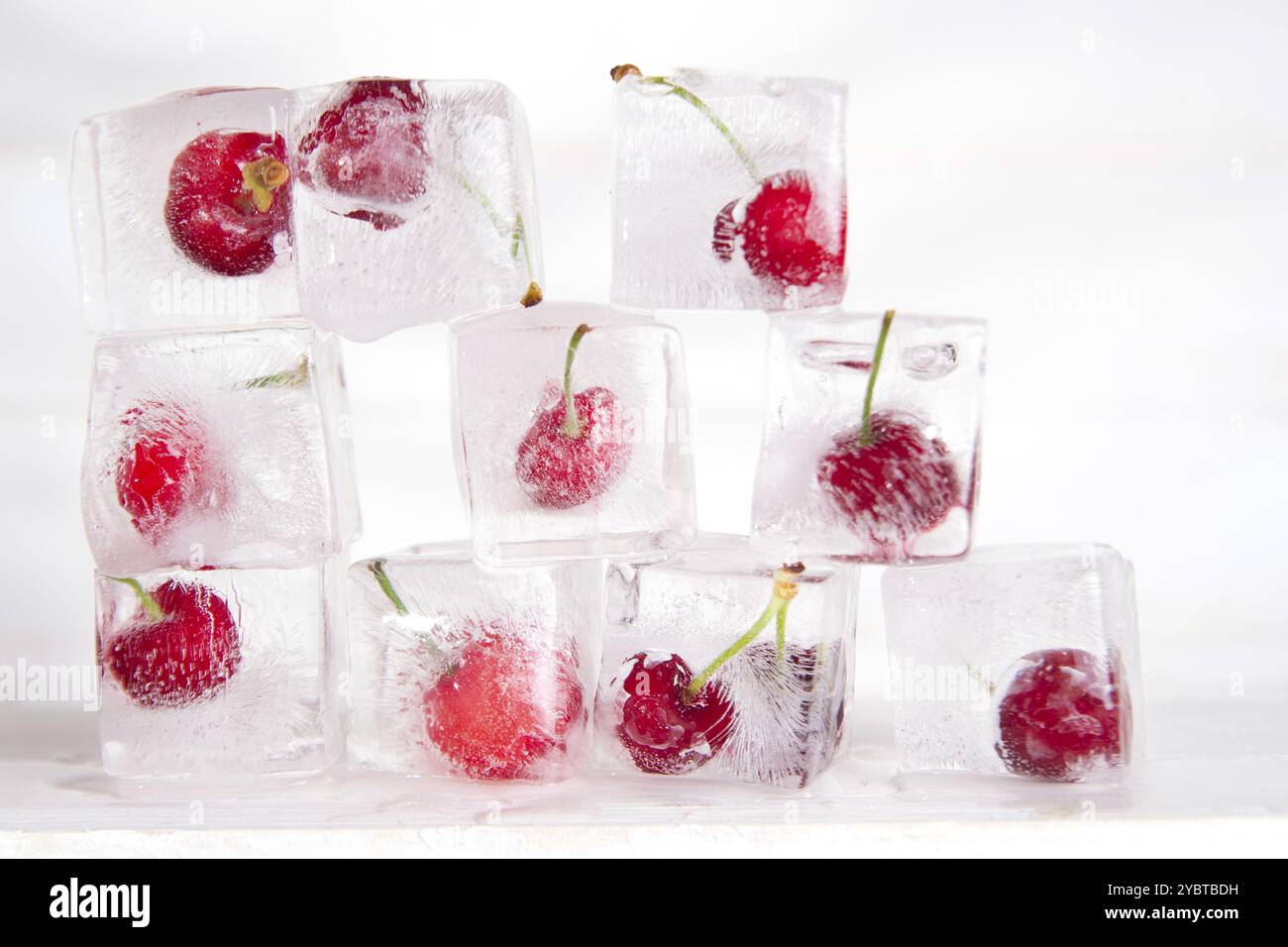 Presentations with ice cubes in cocktail cherries for summer Stock ...