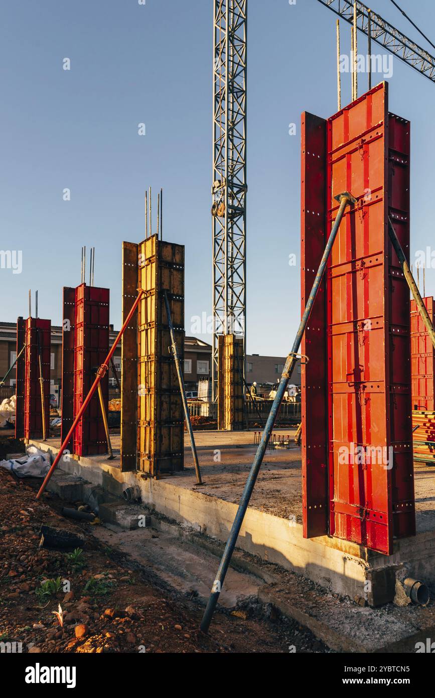 Construction site with steel formworks and reinforcing bars for pillars ...
