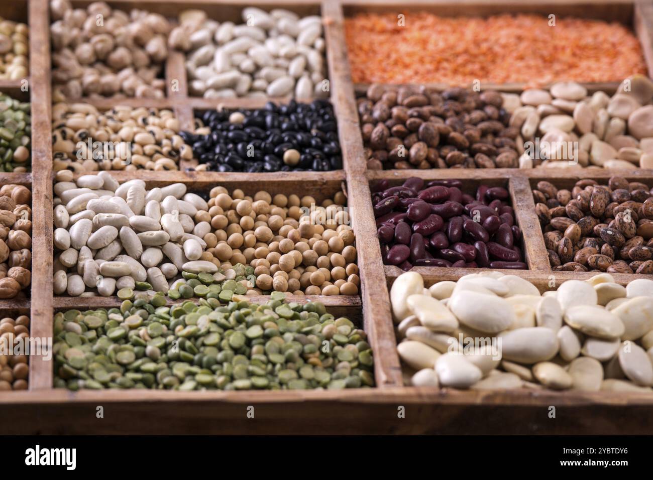 Presentation of mixed seeds of pulses in a display of wood Stock Photo ...