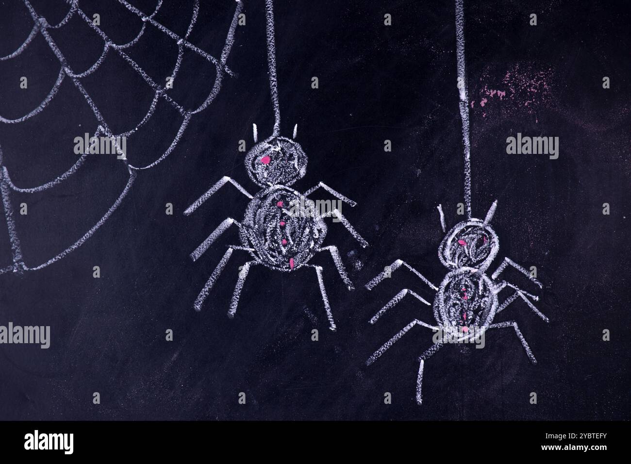 Graphic representation with chalk on the blackboard of arachnophobia ...