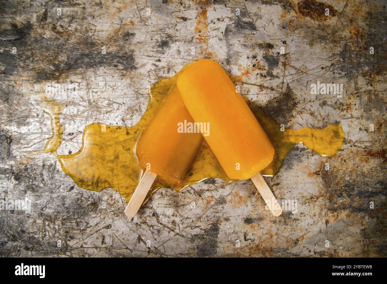 Effect of melting in the heat of the all fruit popsicles Stock Photo ...