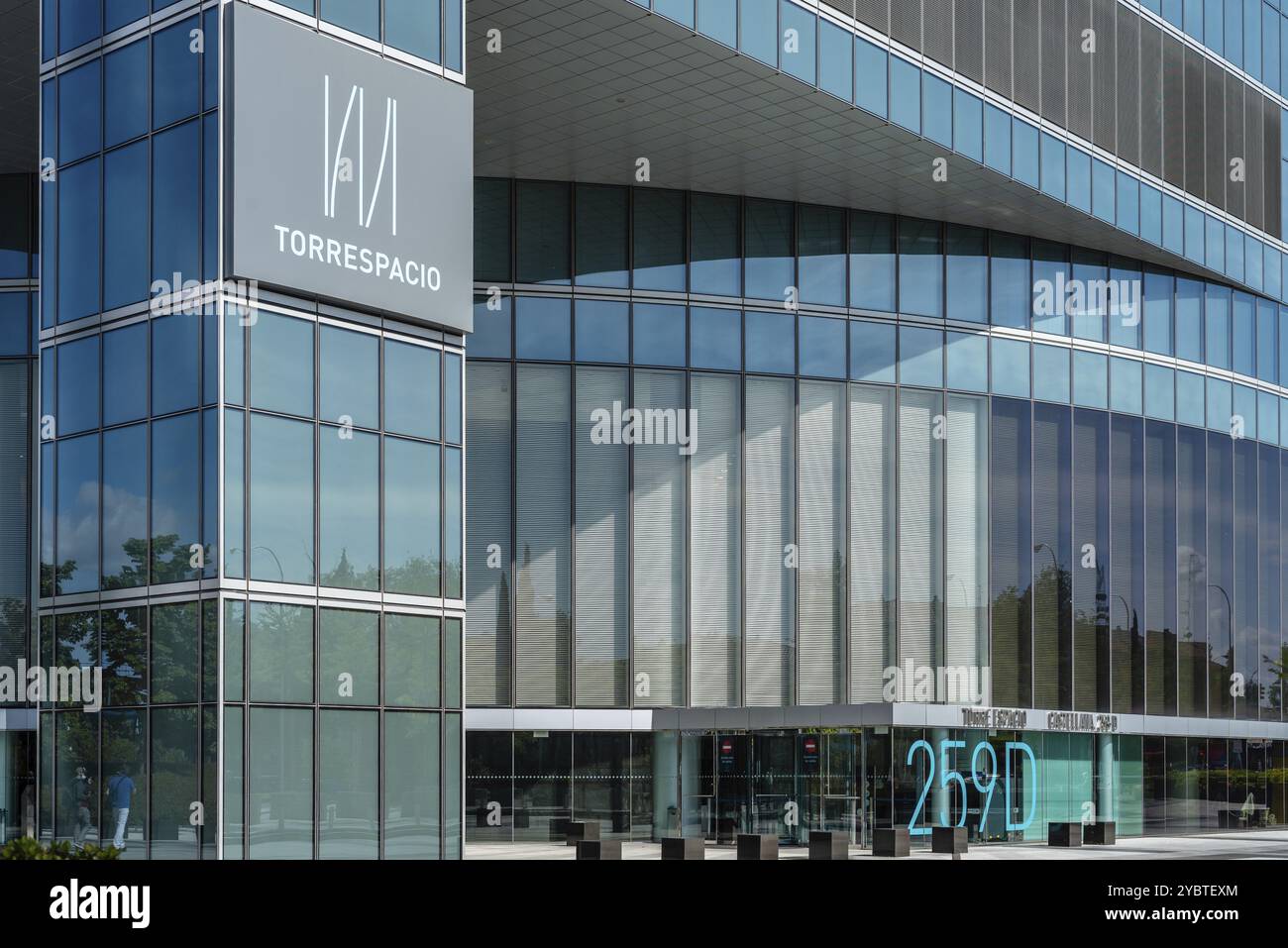 Madrid, Spain, June 14, 2020: Entrance to office building skyscraper in ...