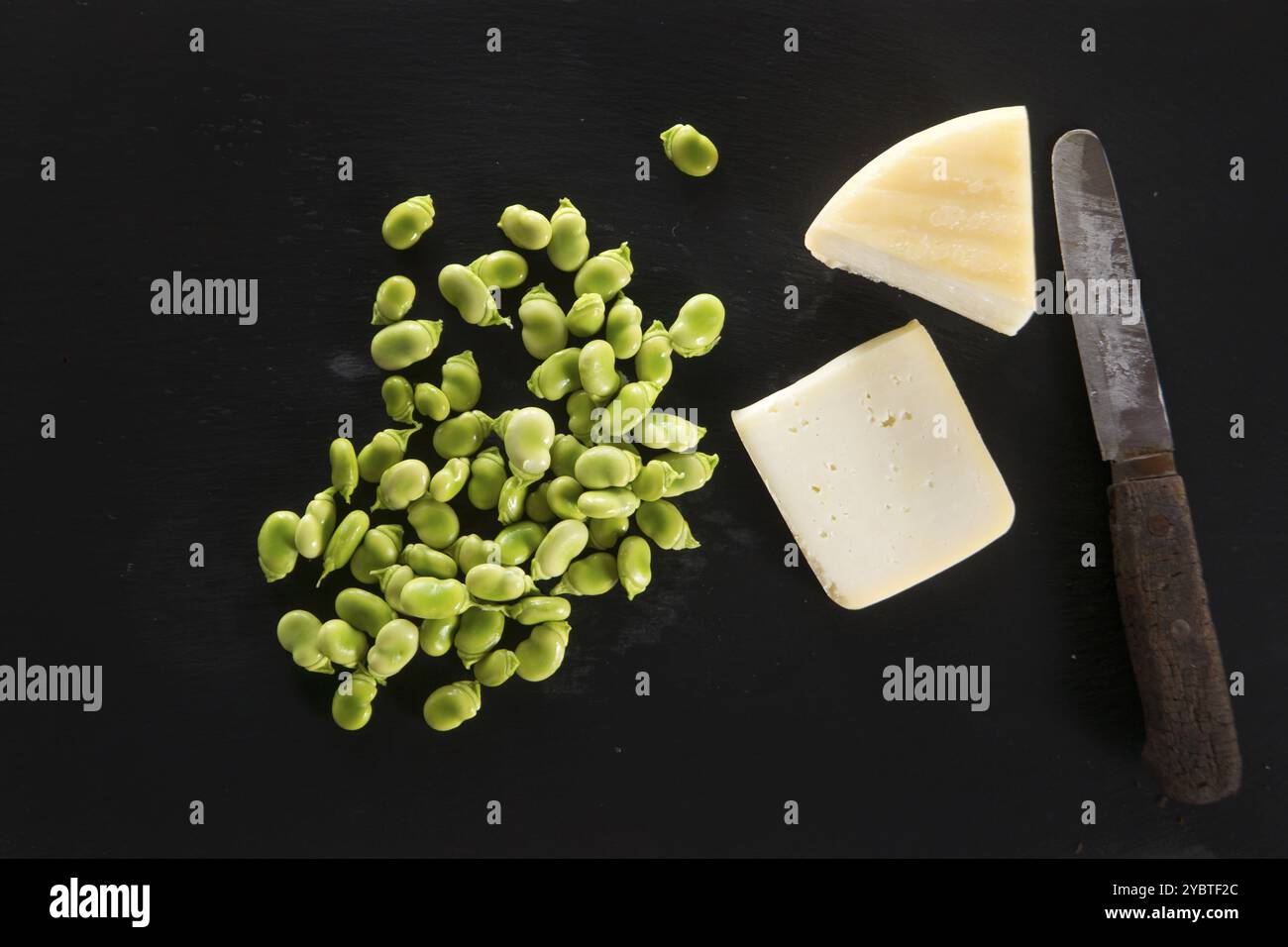 Presentation of a second plate of pods and cheese on slate stone Stock ...