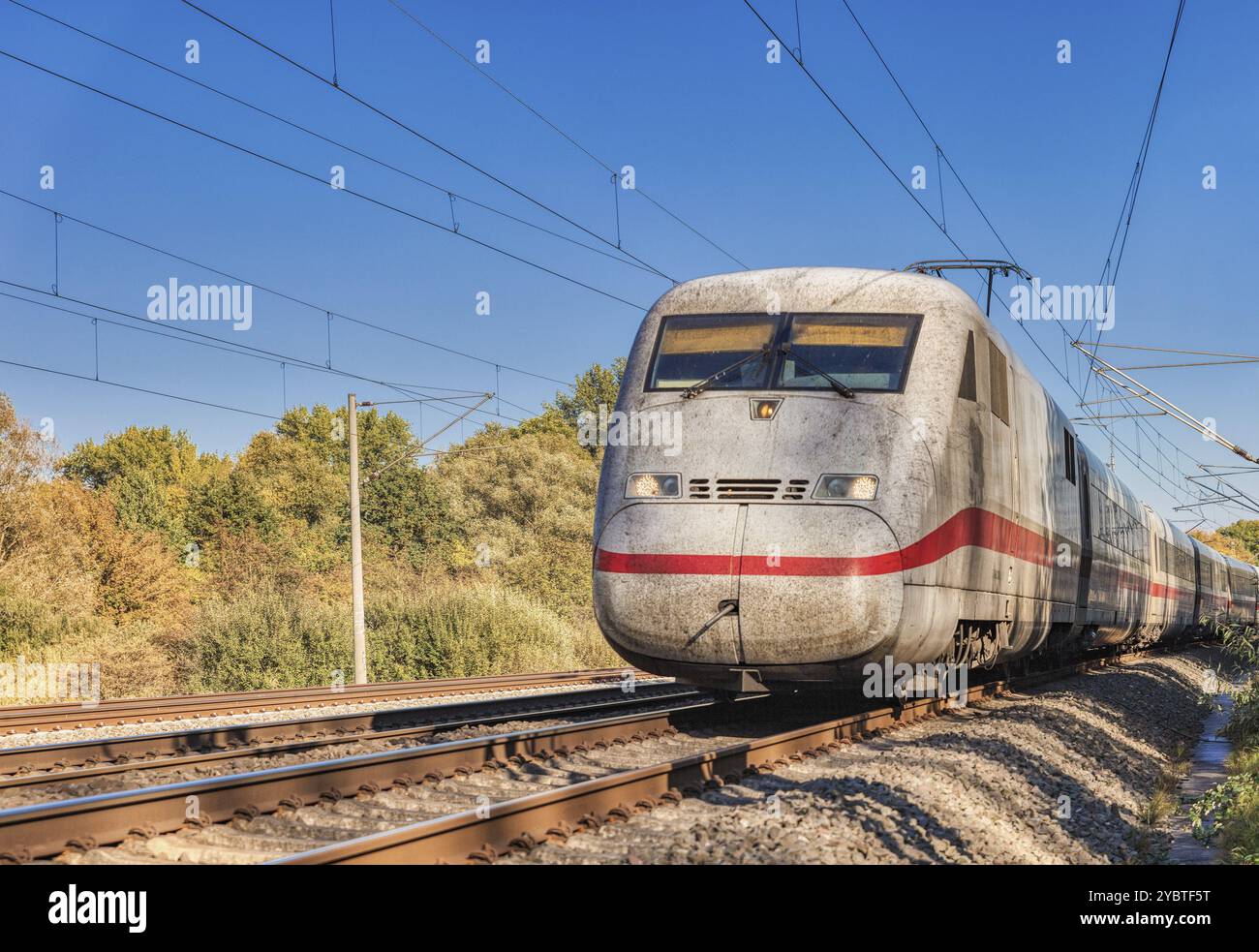 German country train on a golden autumn day Stock Photo - Alamy