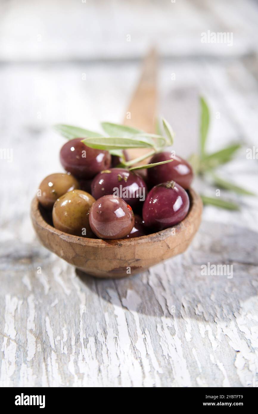 Italian food, snack of olives in brine presented in flat Stock Photo ...