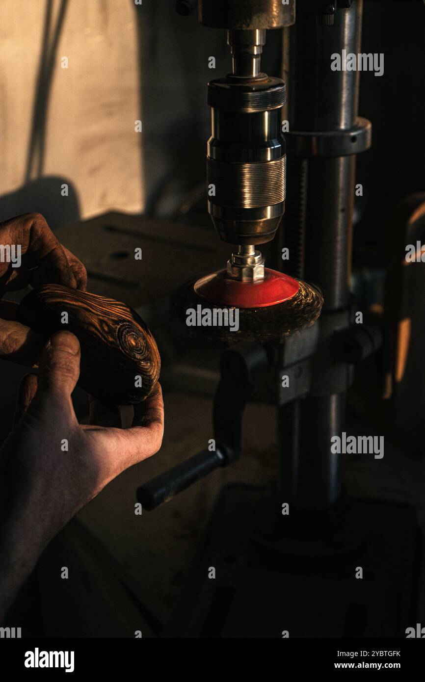 Hands polishing wooden object with Stock Photo - Alamy