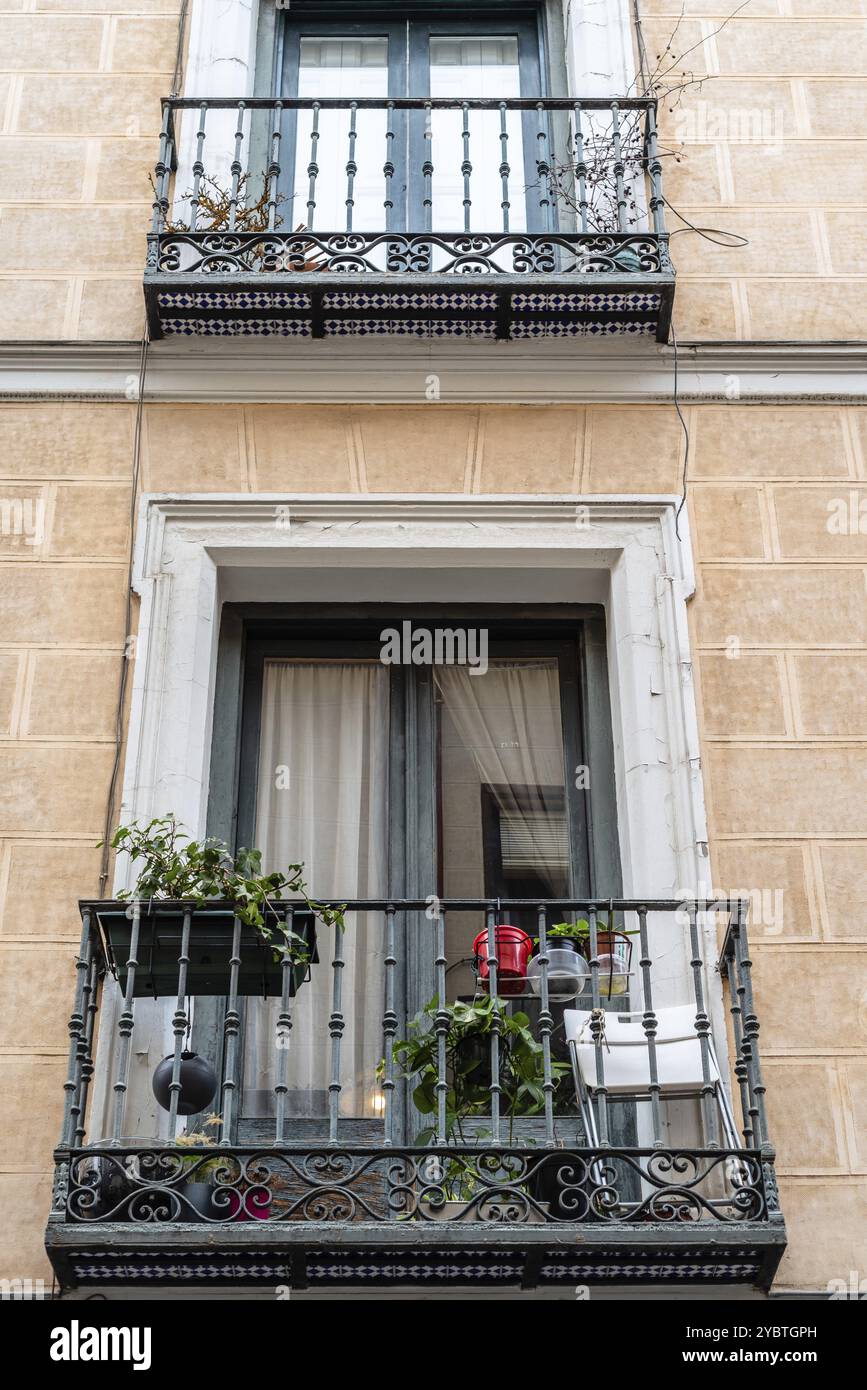 Low angle view of traditional cast iron balconies of old residential ...