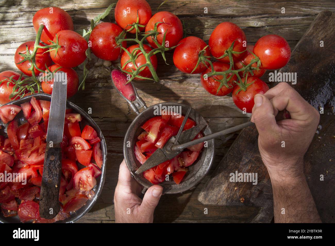 Preparation with strainer preserve fresh smooth round tomato Stock ...
