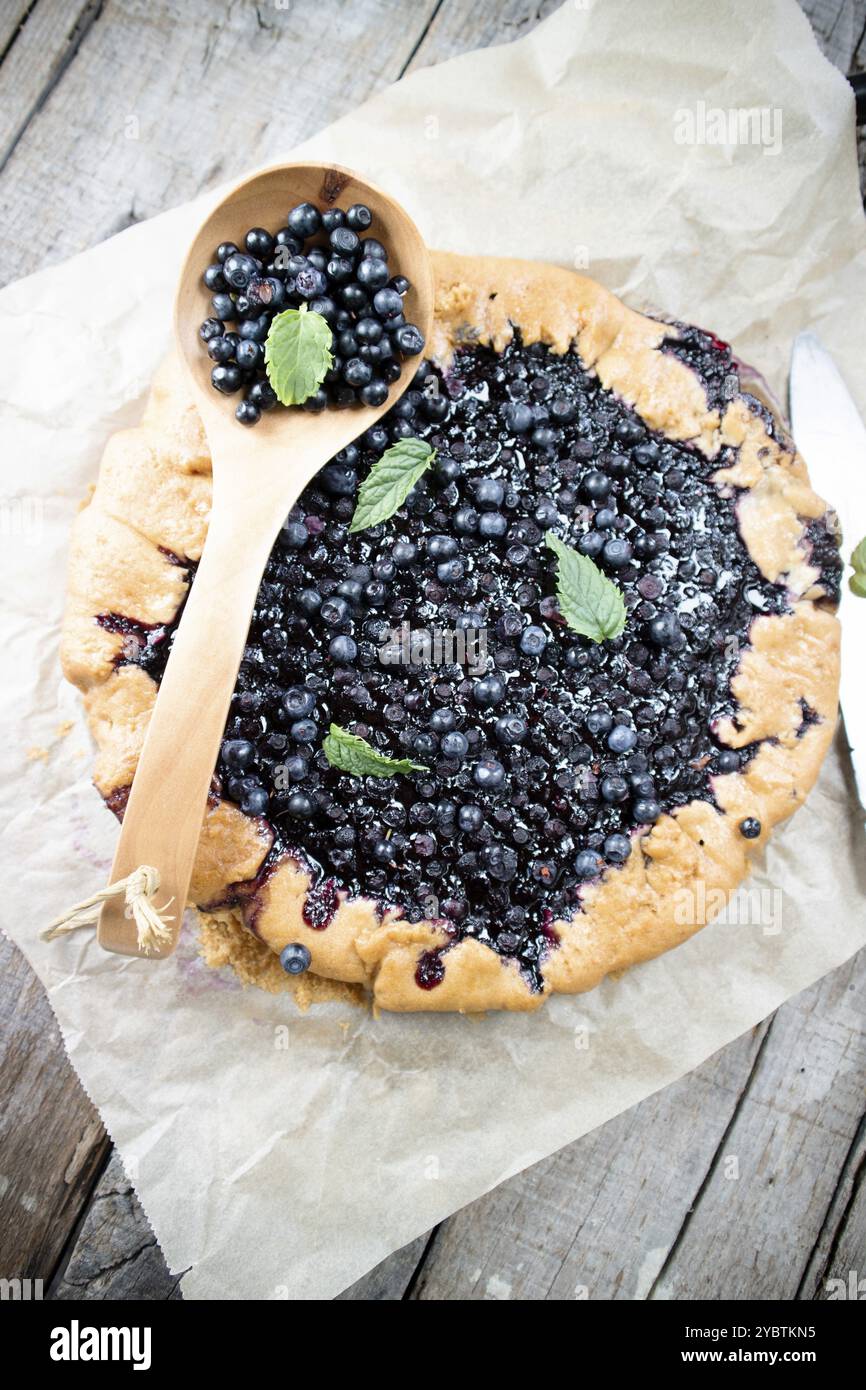 Photographic documentation of a rustic cake made with wild blueberries ...